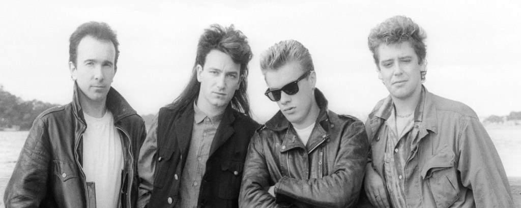 The History and Meaning Behind "One" by U2 - American Songwriter