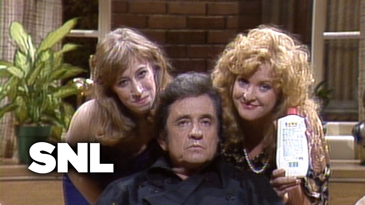 On this Day in Music History: Johnny Cash Trades Outfits with Elton ...