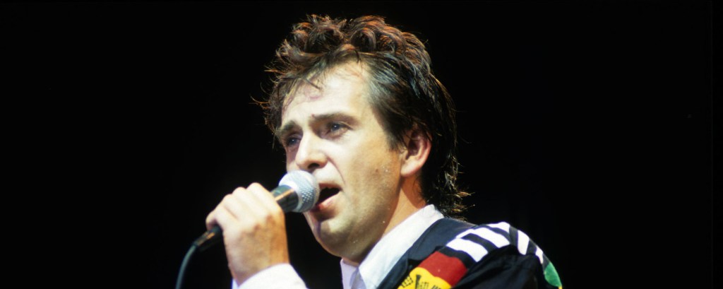 The Meaning Behind "Shock the Monkey" by Peter Gabriel