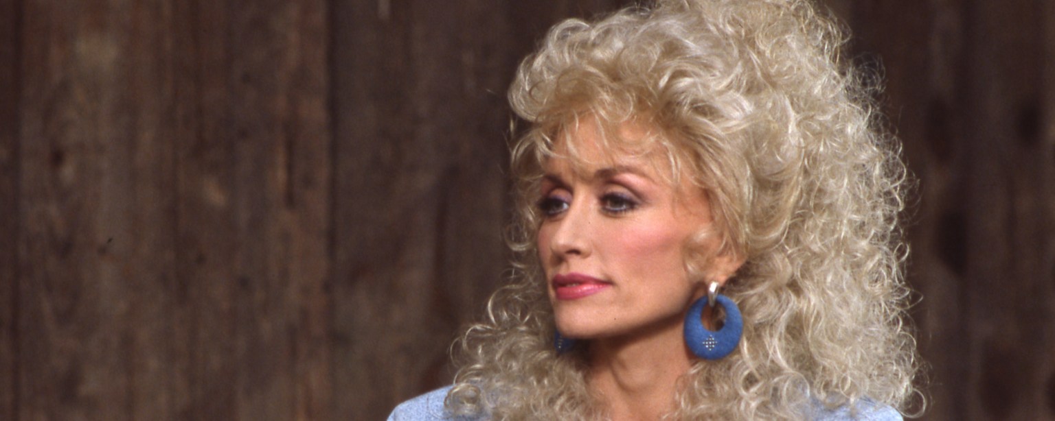 The Meaning Behind "Little Sparrow" by Dolly Parton - American Songwriter