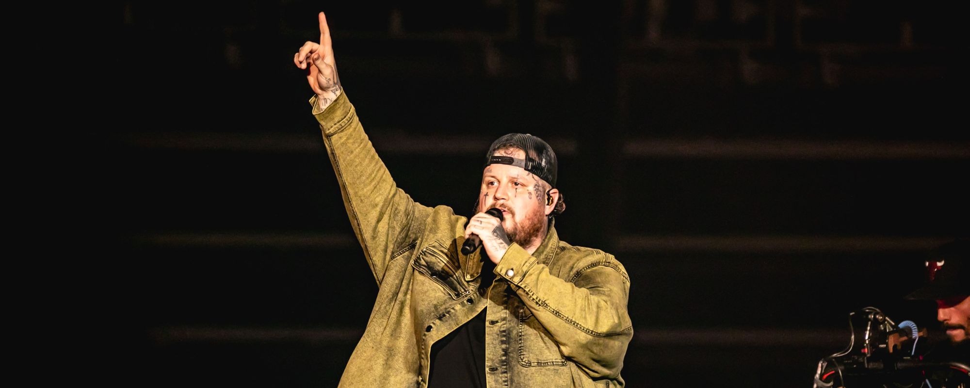Watch: Jelly Roll Makes a Surprise Appearance at the Grand Ole Opry to ...