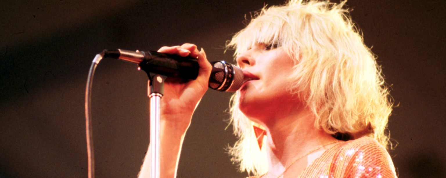 The Meaning Behind “Call Me” by Blondie - American Songwriter