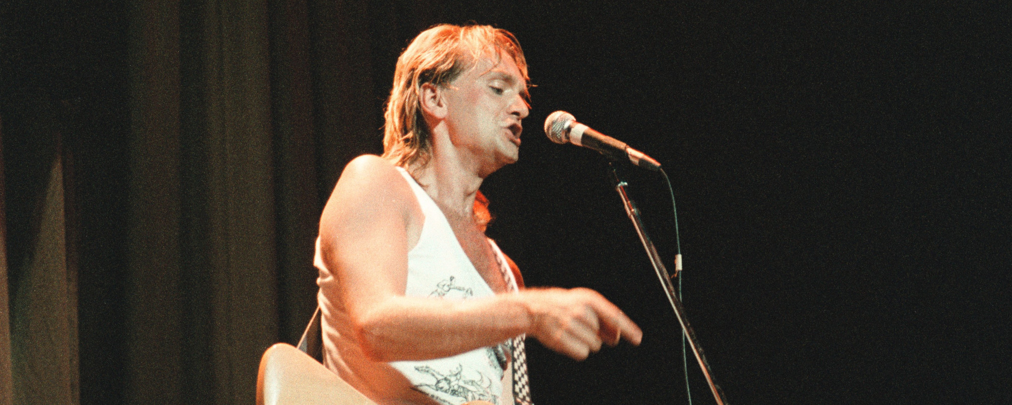 The 11 Best Harmonica Players Ever - American Songwriter