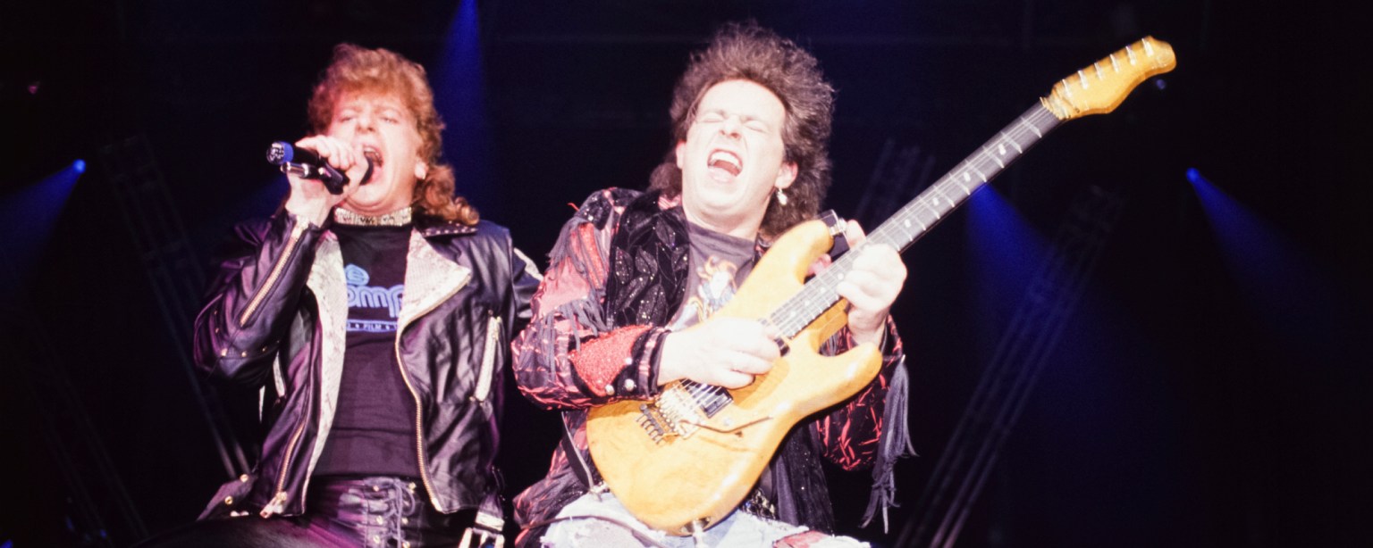 The Meaning Behind "Hold the Line" by Toto - American Songwriter