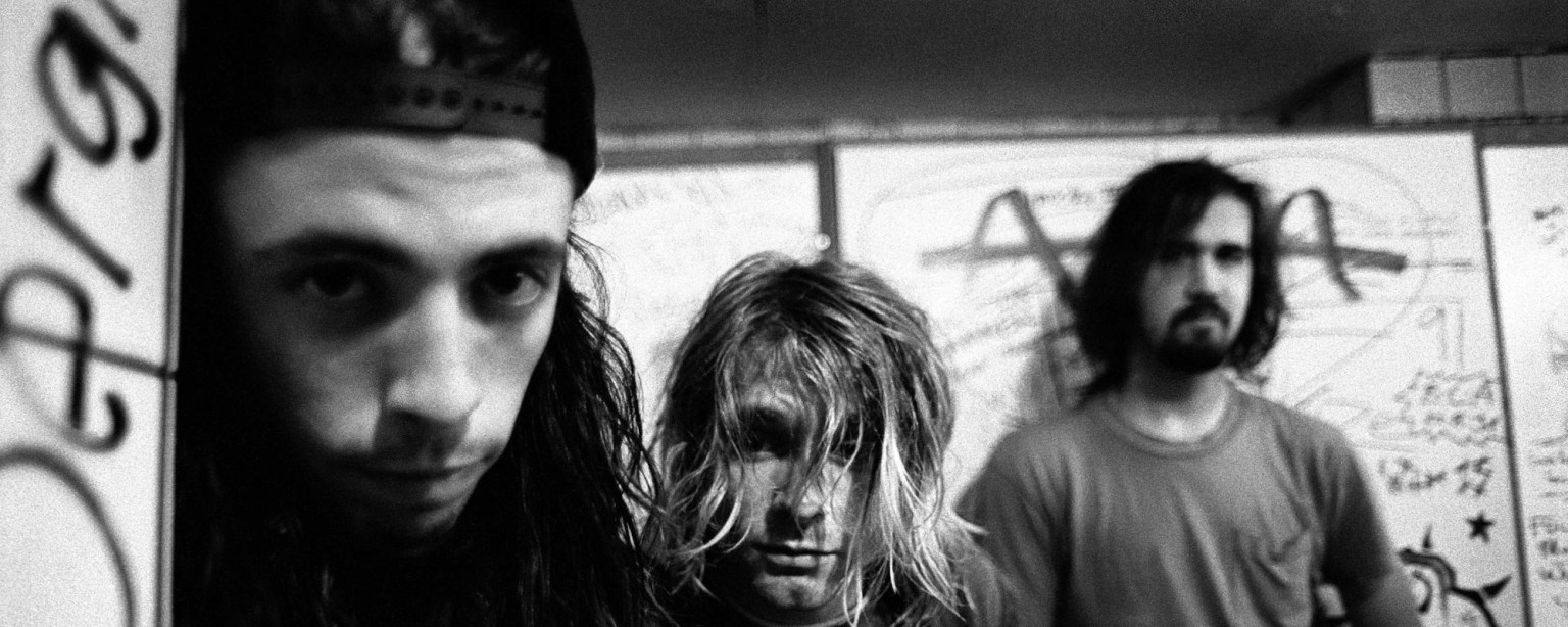 The Story and Meaning Behind Nirvana's Infamous Smiley Face Logo ...
