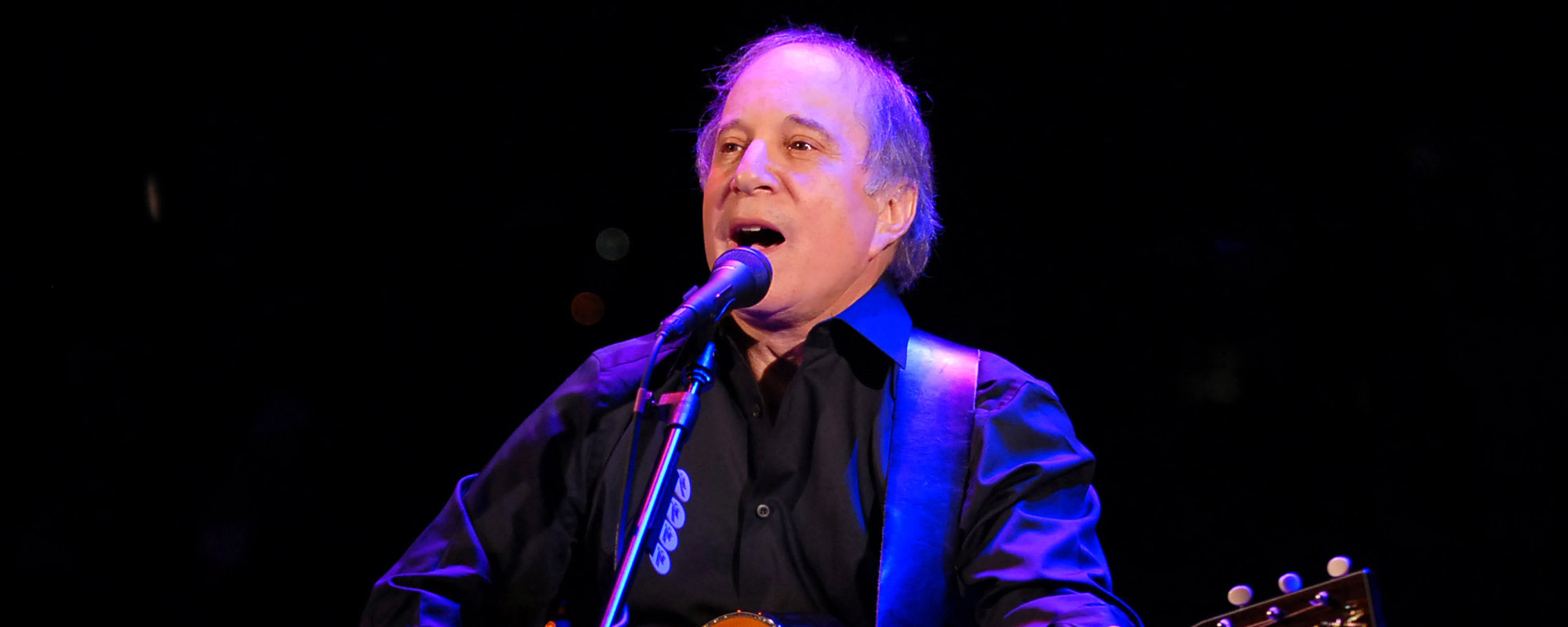 The Meaning Behind Paul Simon's "Me and Julio Down by the Schoolyard"