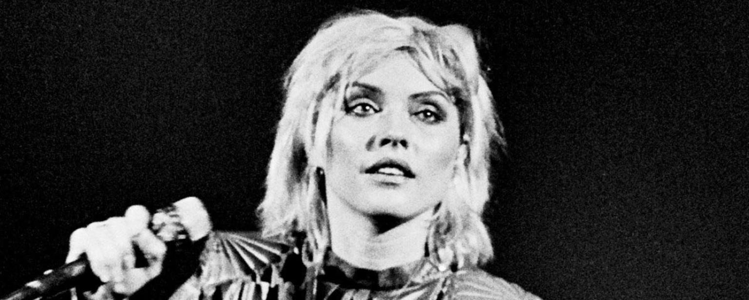 The Meaning Behind “Call Me” by Blondie - American Songwriter