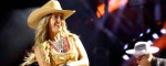 The Fearless Meaning Behind Lainey Wilson's "Heart Like a Truck"