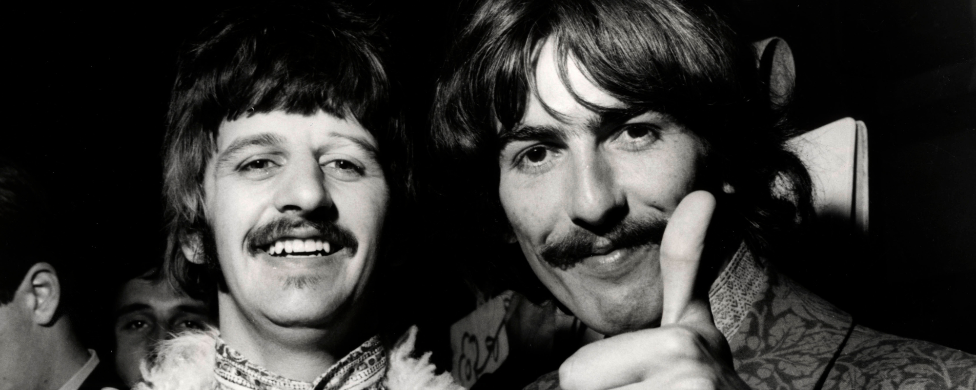 Behind the Meaning of the Wide-Eyed Hopeful "Give Me Love (Give Me ...