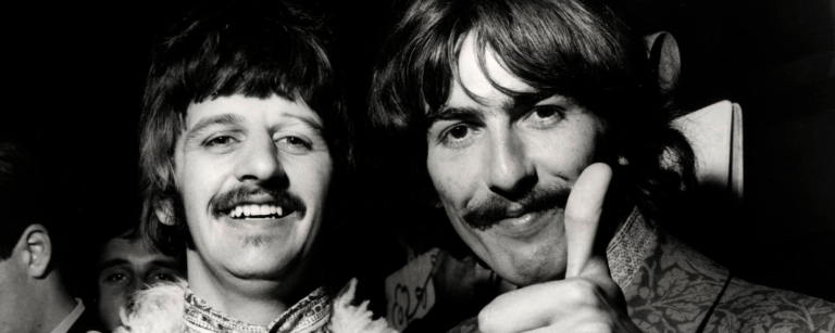 Behind the Meaning of the Wide-Eyed Hopeful "Give Me Love (Give Me ...