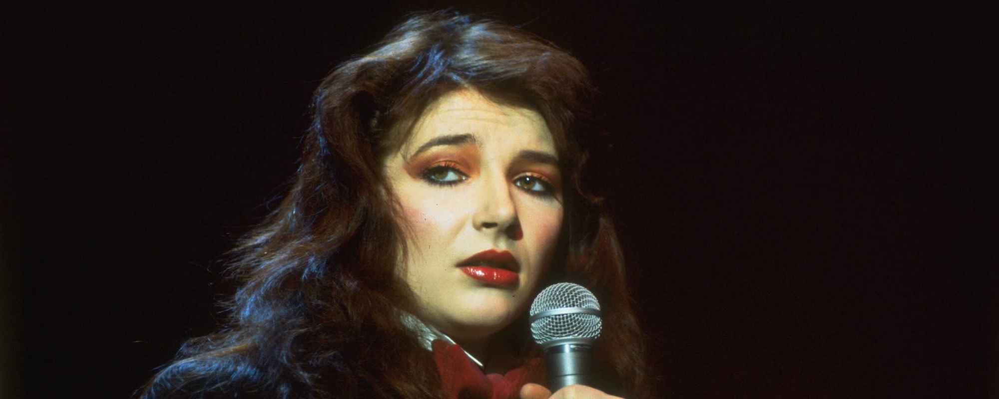 The Story and Meaning Behind "On the Dark Side," the John Cafferty ...