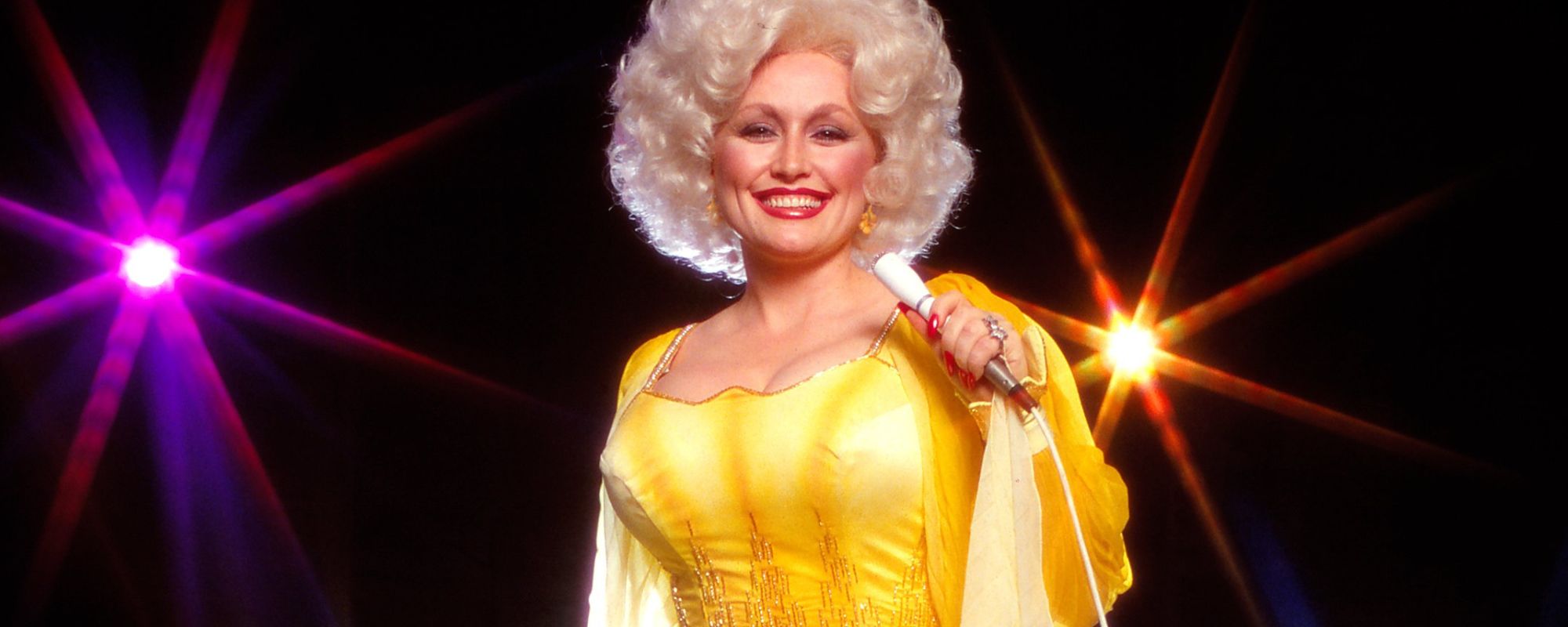 The Meaning Behind "Little Sparrow" by Dolly Parton - American Songwriter