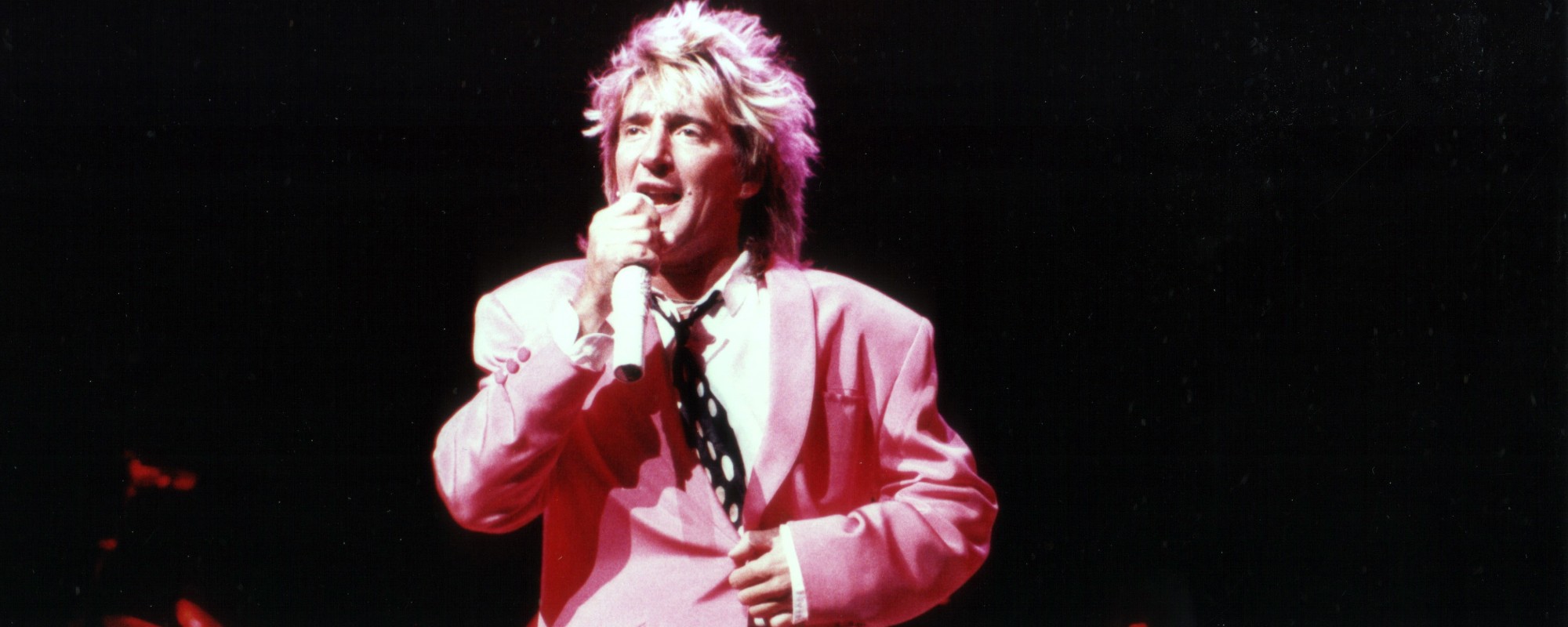 The Meaning Behind "Downtown Train" by Rod Stewart - American Songwriter